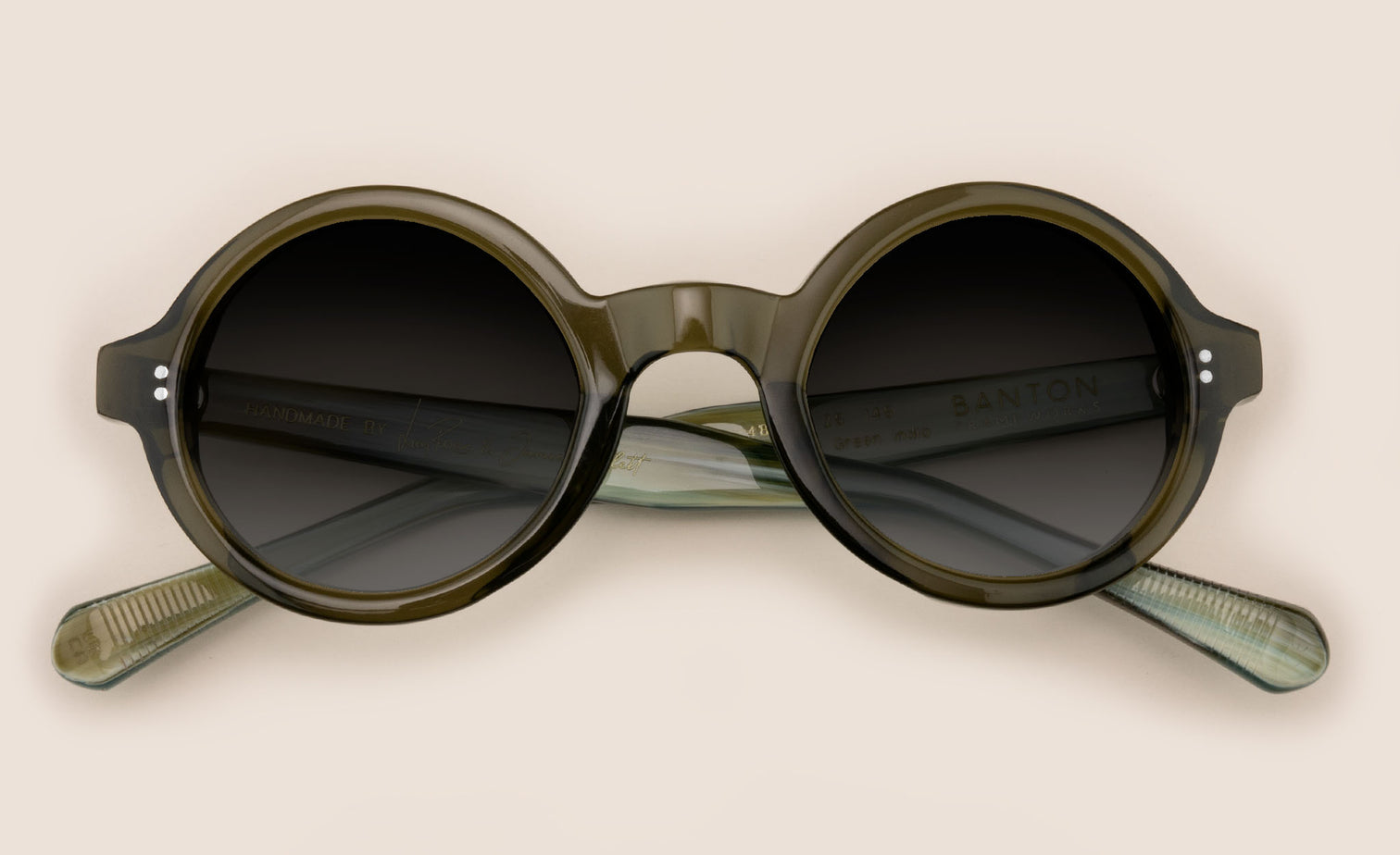 Circular Green Transparent Sunglasses | Linea H | Banton Frameworks