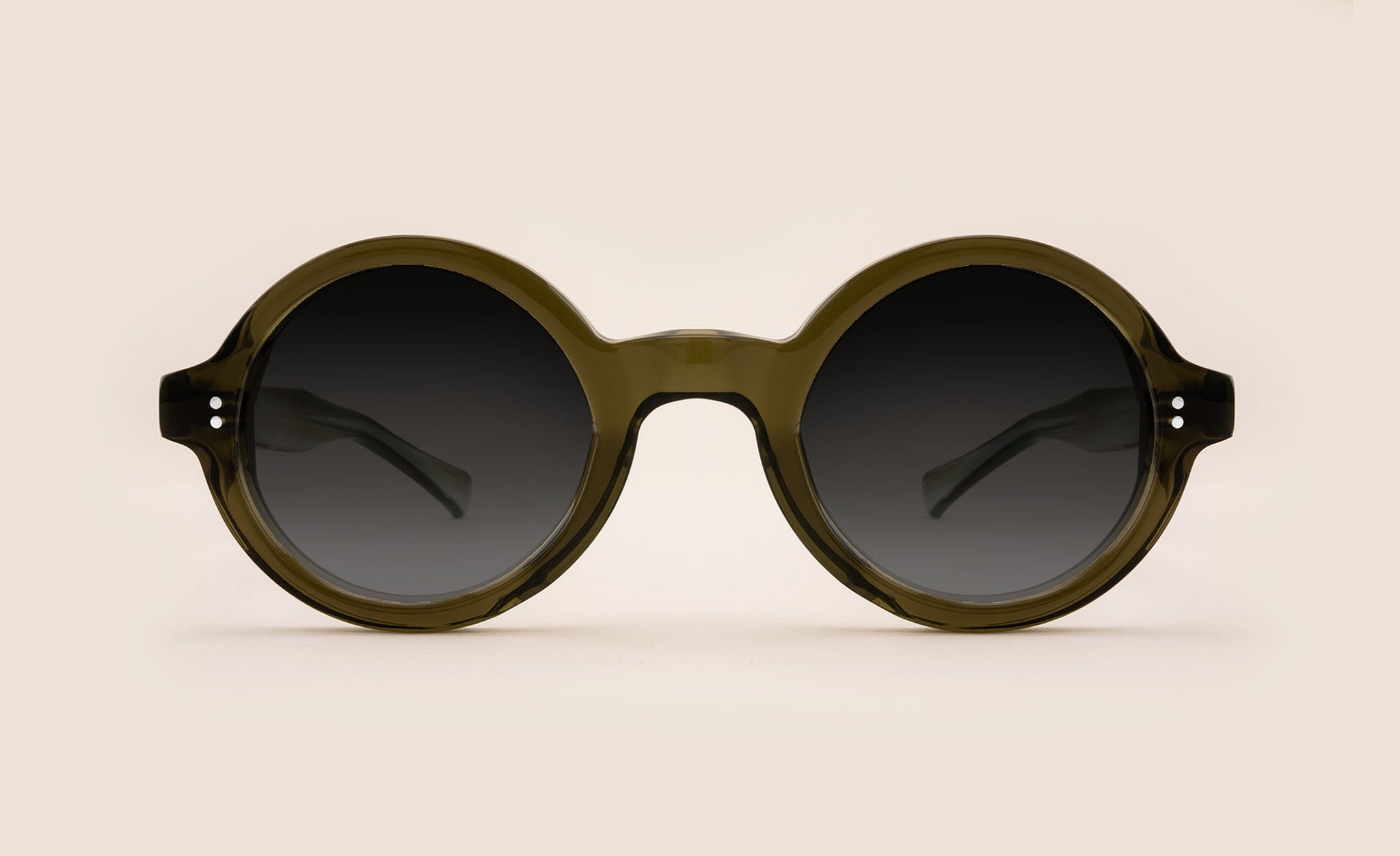 Circular Green Transparent Sunglasses | Linea H | Banton Frameworks